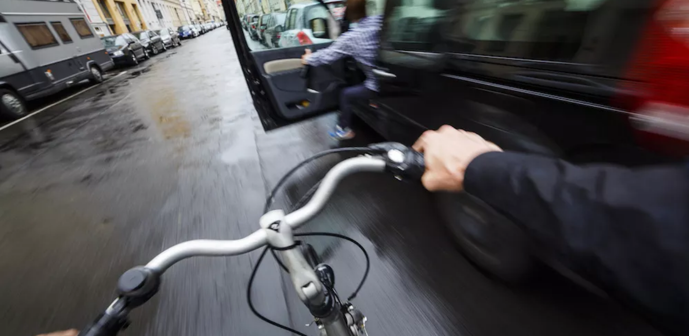 Dooring: What It Is And How You Can Avoid It?